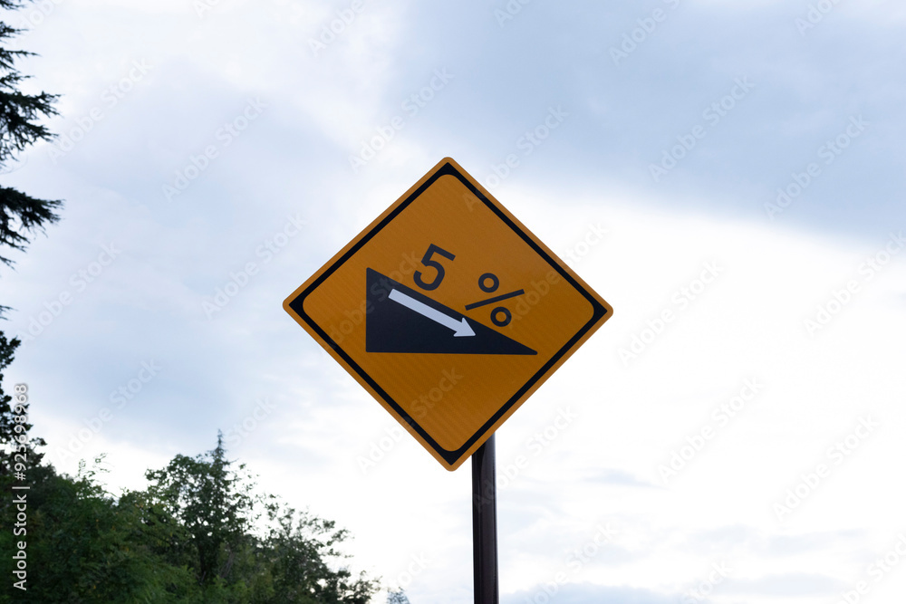 Warning Sign Indicating 5% Downhill Grade: Essential Road Safety Marker ...