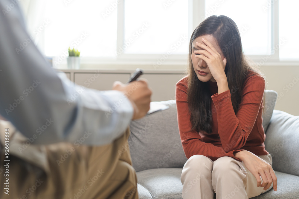 Psychology, depression. Sad asian young woman consultation with ...