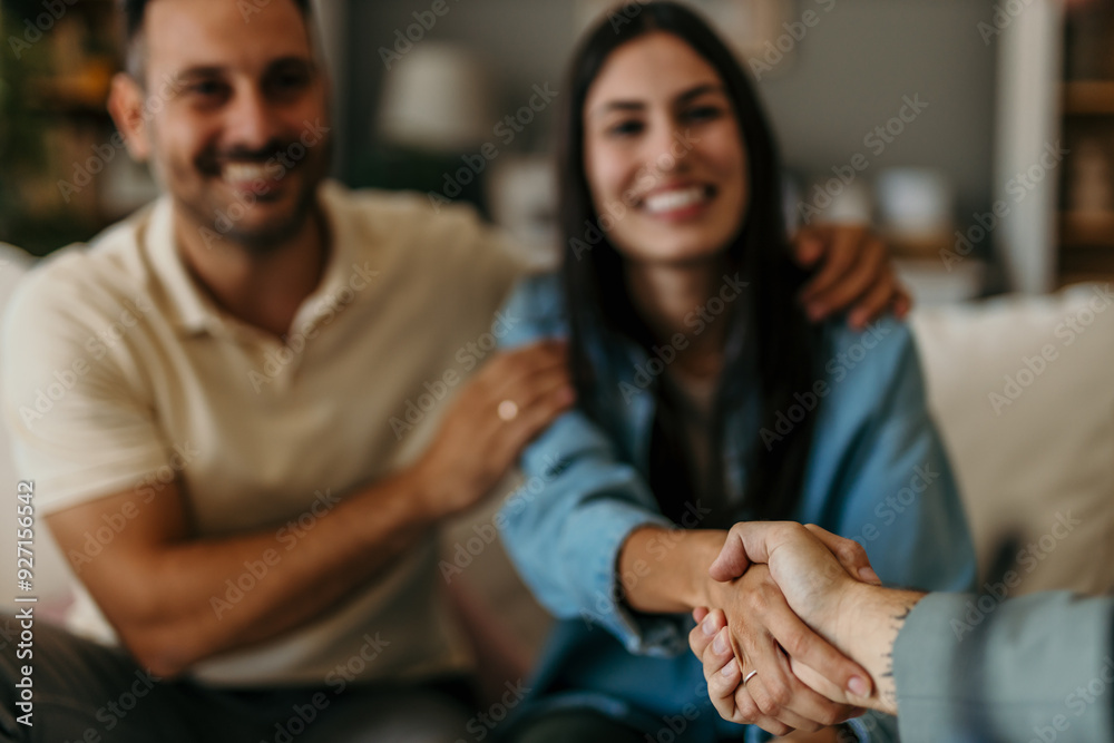 Happy man and woman clients handshake close deal with a legal adviser ...