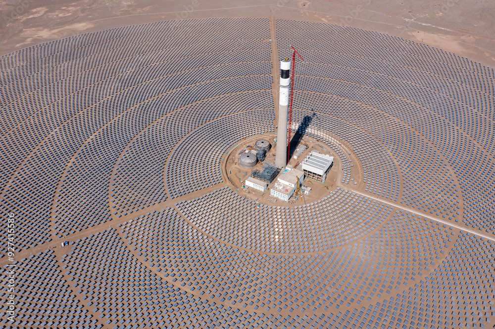 Aerial photo of molten salt tower solar thermal power plant under ...