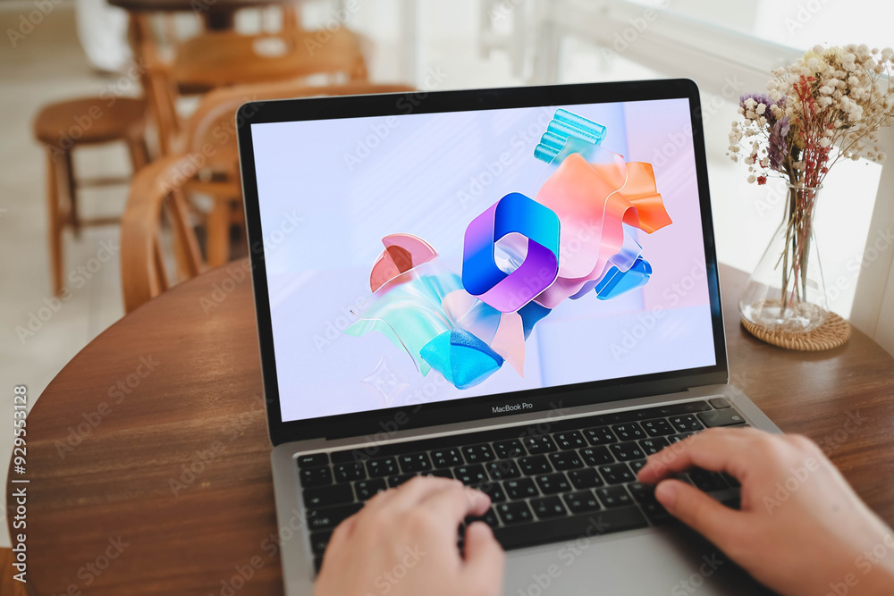 Bangkok. Thailand. Aug 20,2024 :A man useing laptop computer displaying ...