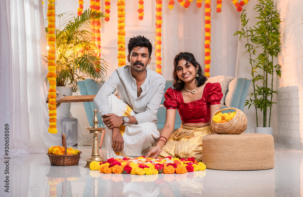 Onam background Kerala couple making Onam flower decoration, Happy Onam ...