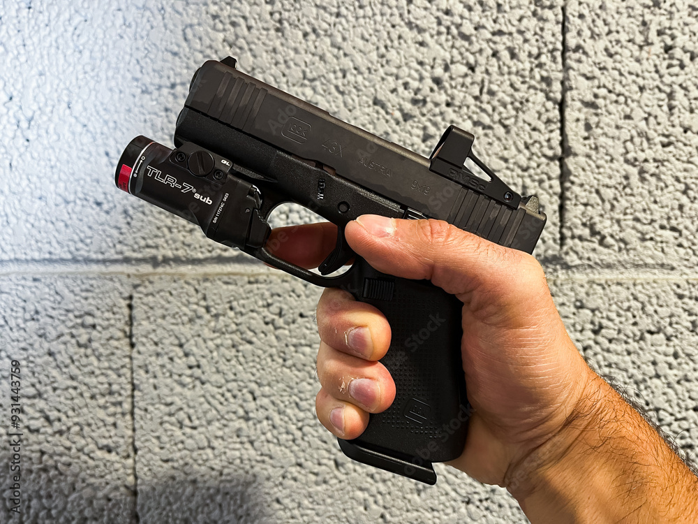 Baltic States, August 19, 2024. Glock 43x mos pistol with red dot and ...