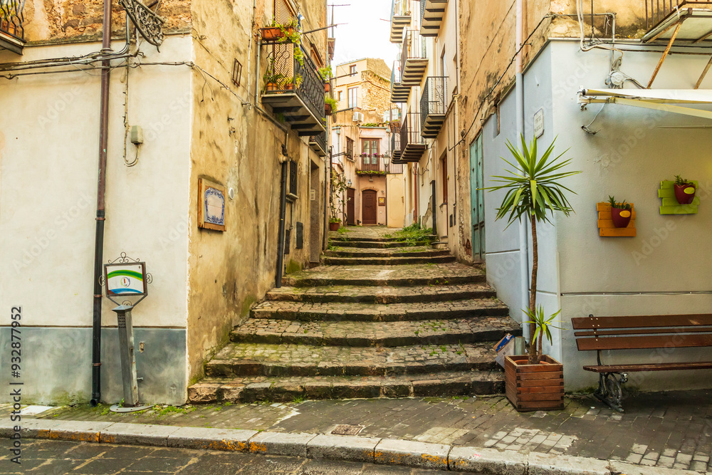 Italy, Sicily, Palermo Province, Castelbuono. Stairs on a narrow side ...