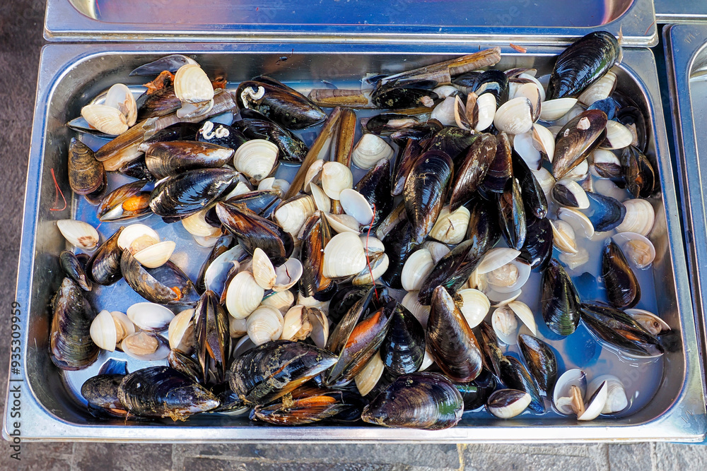 The photo shows seafood at the fish market in the charming village of ...