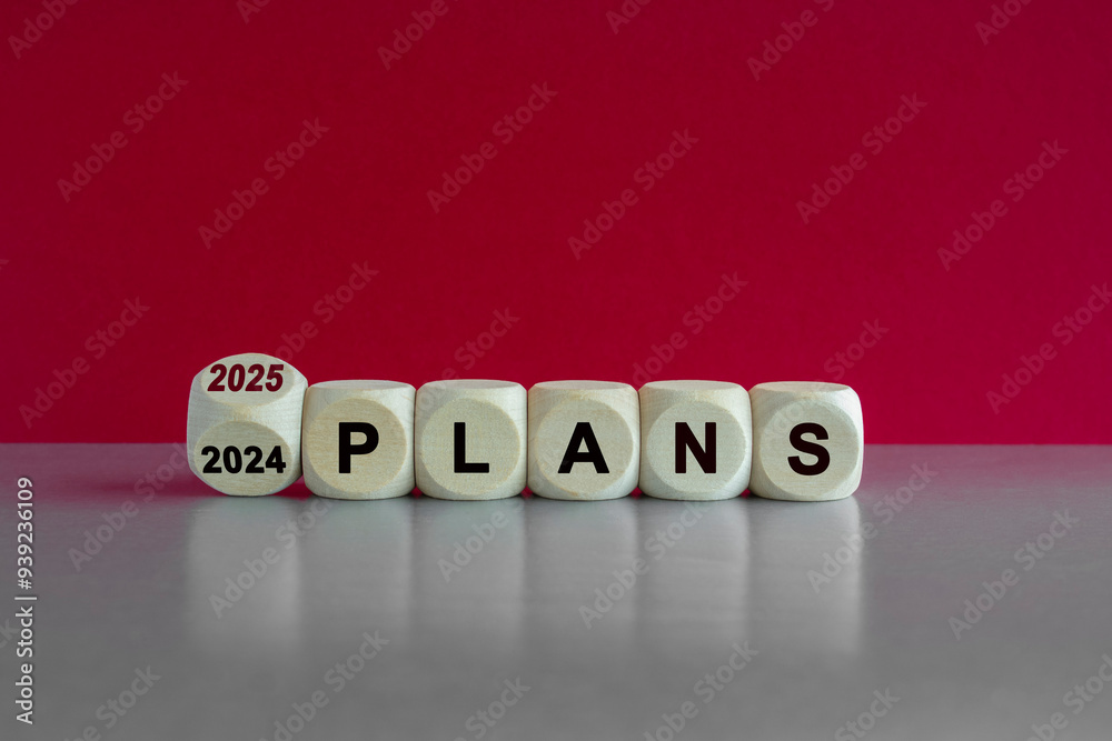 2025 plans new year symbol. Turned a wooden cube and changes words Plan ...
