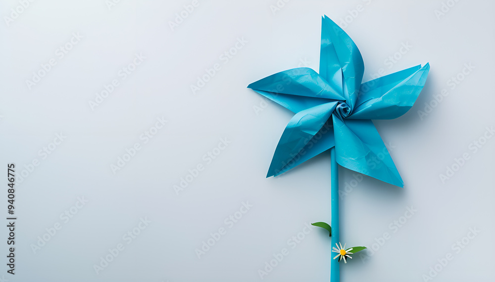 pinwheel or windmill paper origami isolated on white background simple ...