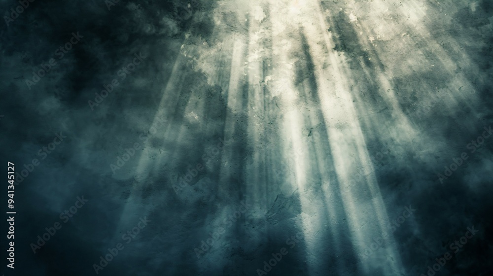Abstract contrast of light and darkness, beams of light piercing ...