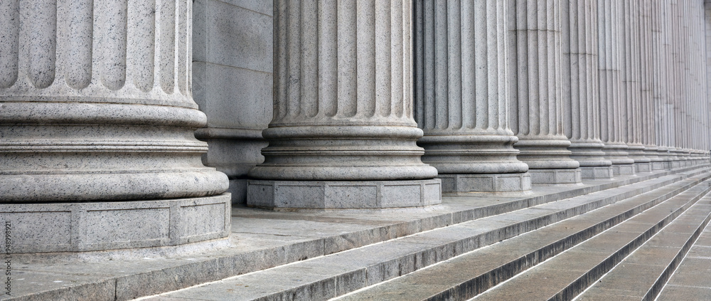 Stone colonnade and stairs detail. Classical pillars row in a building ...
