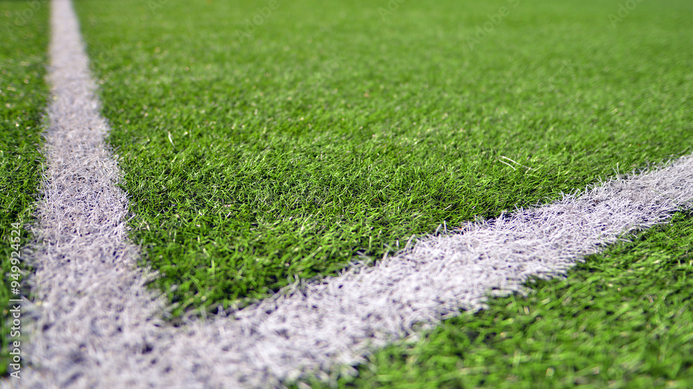 Artificial football turf with a white dividing line. Texture of Perfect ...
