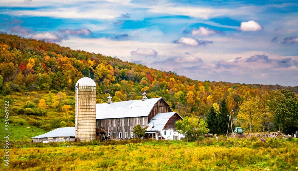 View of farm with barn and Silo in the finger lakes region of Upper New ...