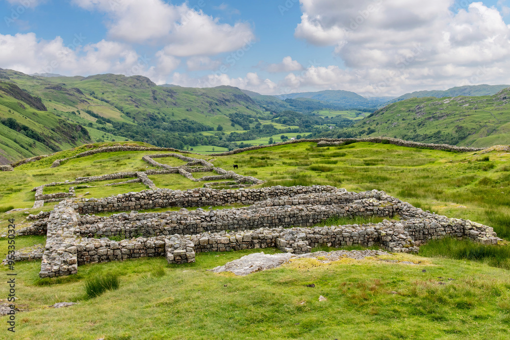 Remains of the walls of Hardknott Roman Fort archeological site with ...