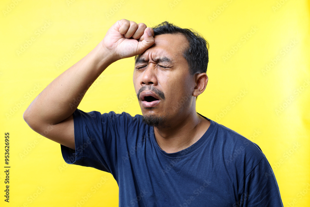 Asian male desperation, regrets about something, dressed in casual t ...