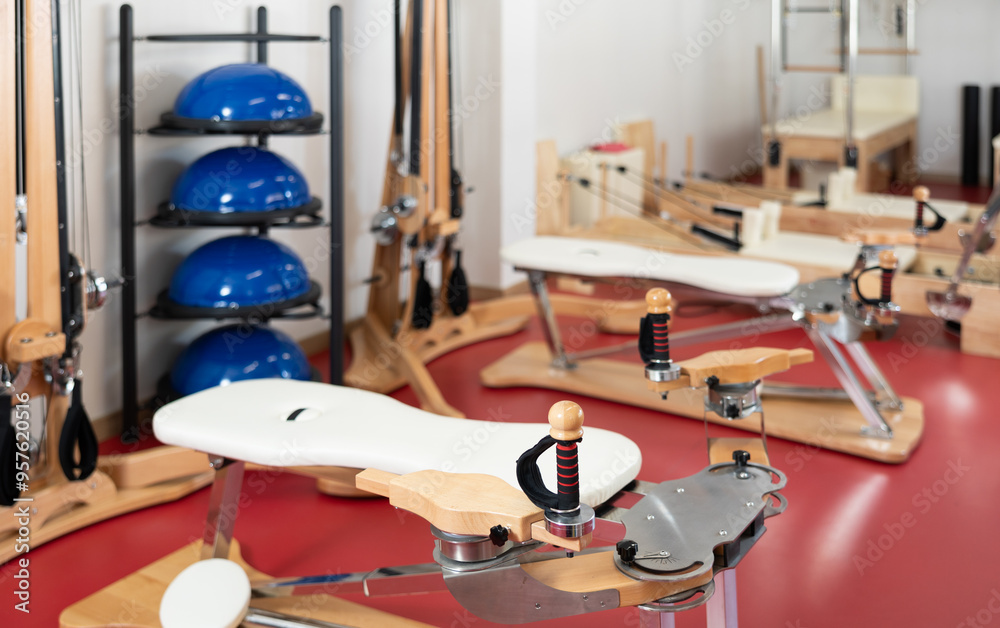 In modern gym there is equipment for Pilates training -reformer bed ...