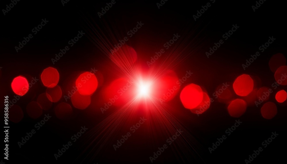 abstract red lens flare on black background, bokeh defocused lights and ...