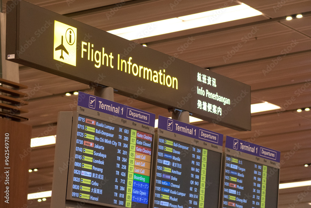 Flight connection information board seen at Singapore Changi Airport ...
