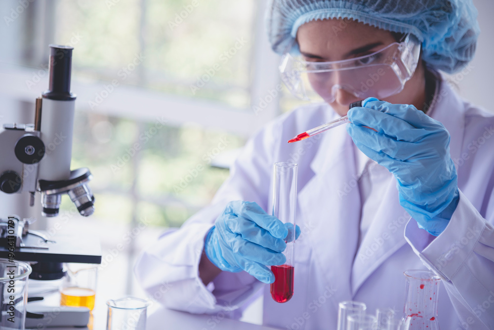 Scientist woman holding chemical test glass tube testing science ...