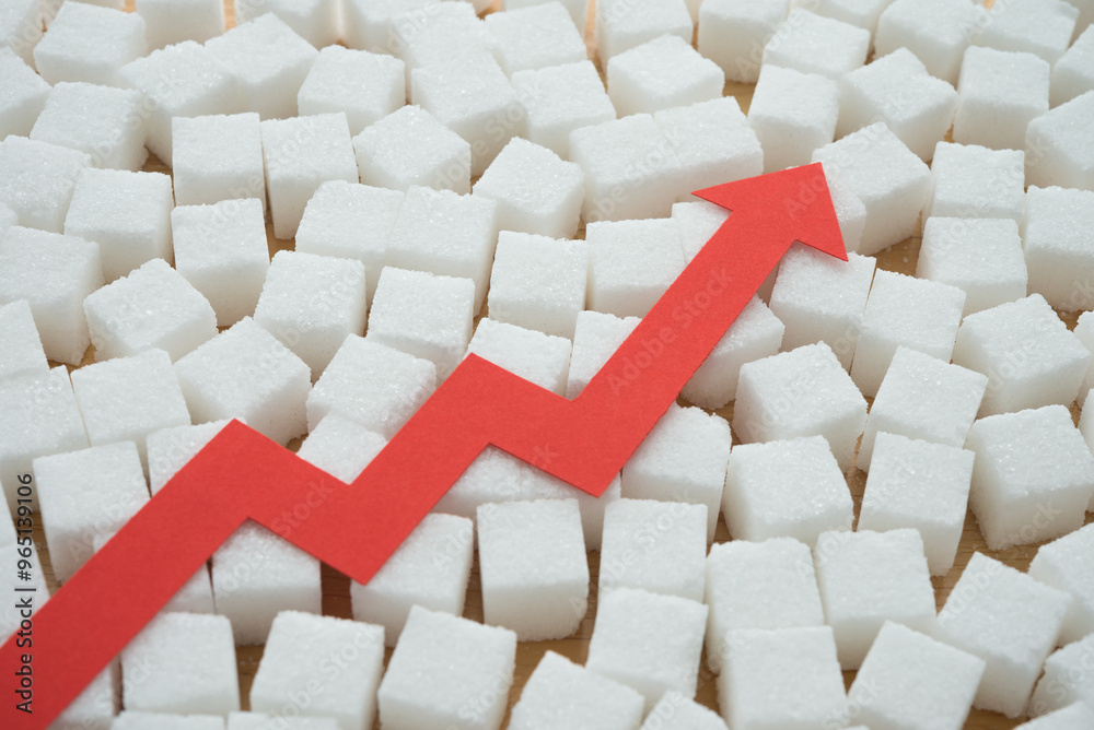 Red arrow graph growth rising up trend on sweet sugar cubes background ...