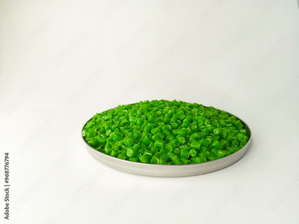 Green masterbatch granule, green pigment, green granules in a cup, cold ...