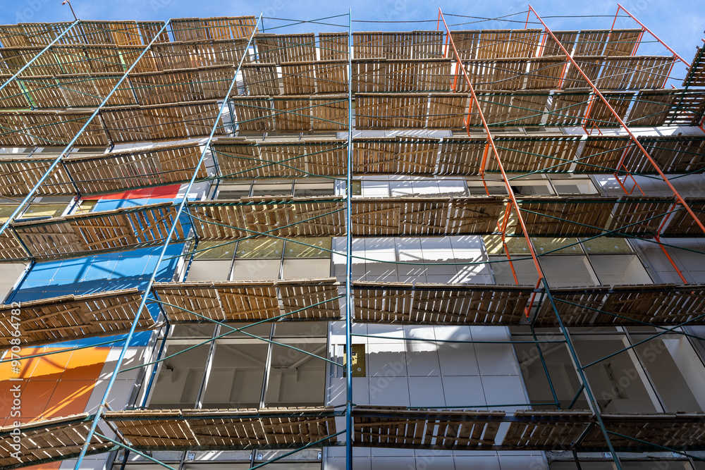 Building facade renovation, scaffolding. Extensive scaffolding ...