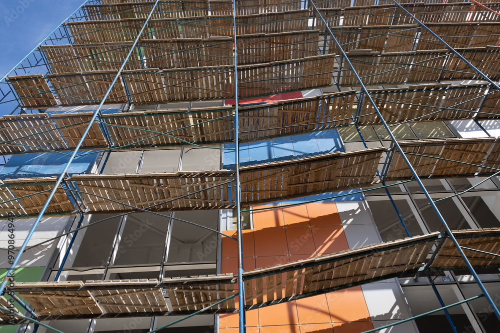 Building facade renovation, scaffolding. Extensive scaffolding ...