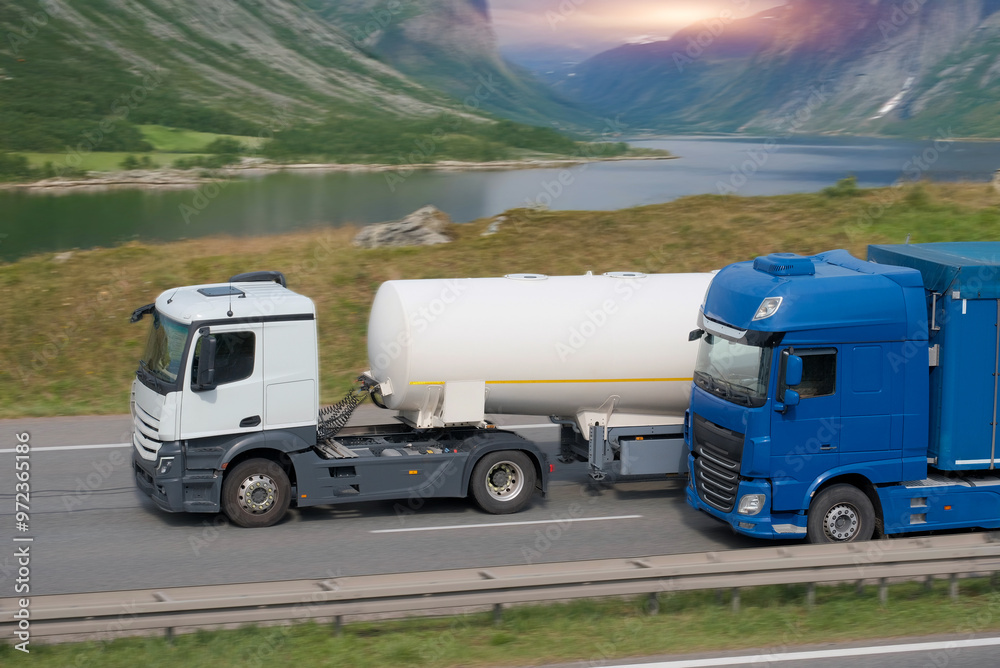 Road Tanker With Cargo In Transit Tank Overtaking Cargo Truck On ...