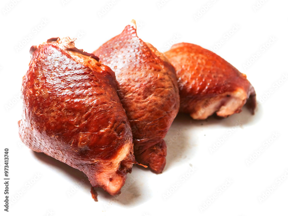 Smoked chicken three thigh on the bone on white background. High ...