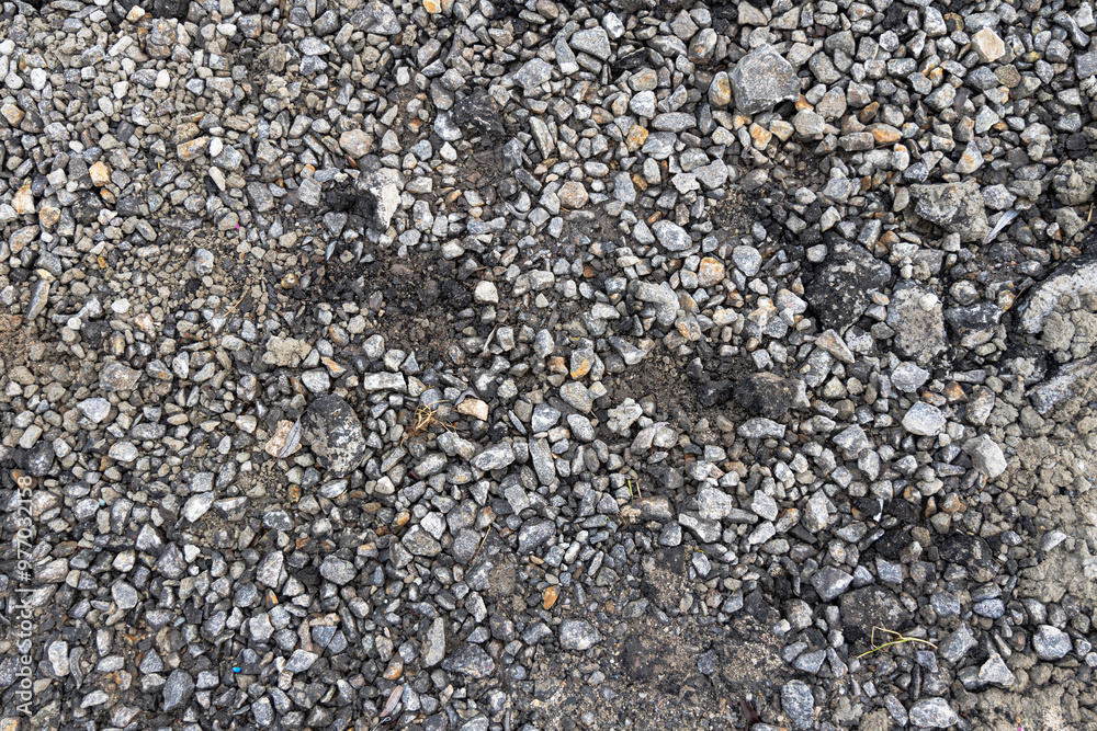 dirty gravel textured ground cover before road working asphalt making ...
