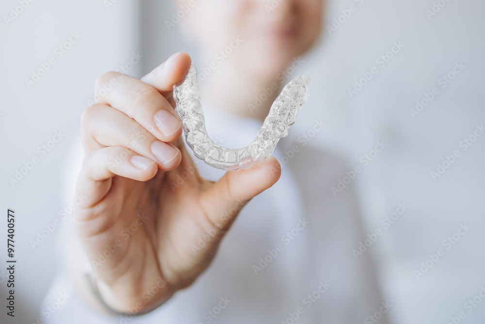 Doctor Showing A Transparent Aligner Tray, Holding Invisalign-Like For ...