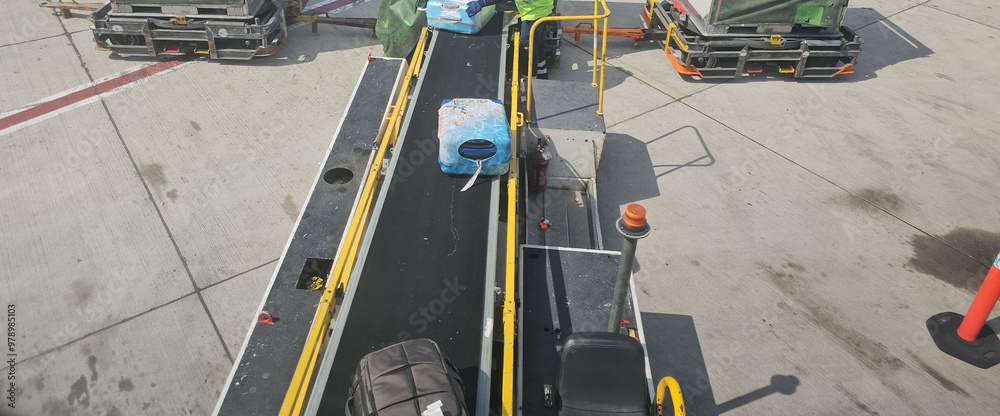 Baggage handling system at a busy airport terminal during Stock Photo ...