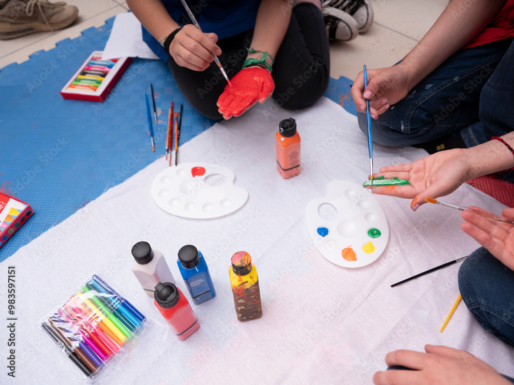 Children and adults make shapes and sculptures with play dough and draw ...