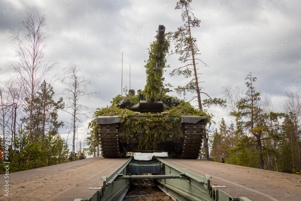 Wide Angle, low perspective - Commanders and gunners directing a ...