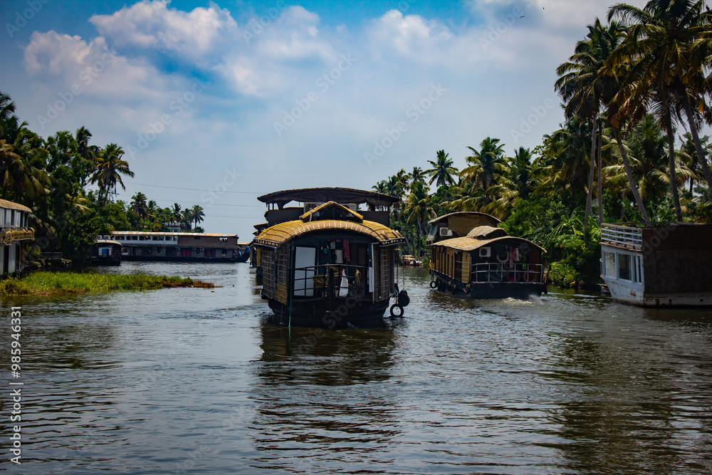 Houseboats cruising along the Alappuzha backwaters in the indian state ...