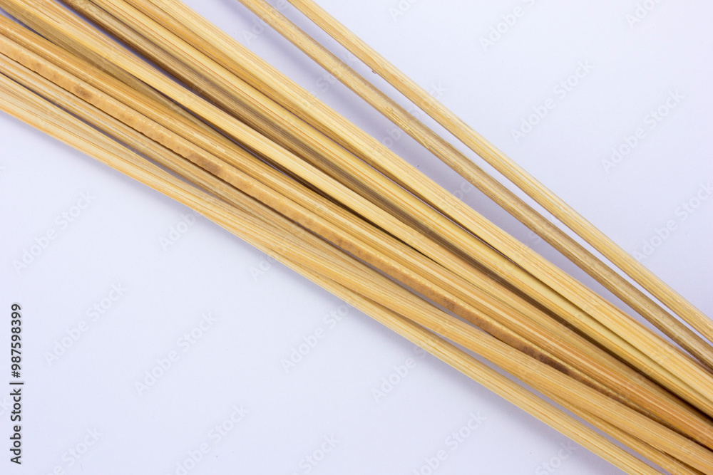 Texture and Simplicity: Explore the fine details of these wooden sticks ...