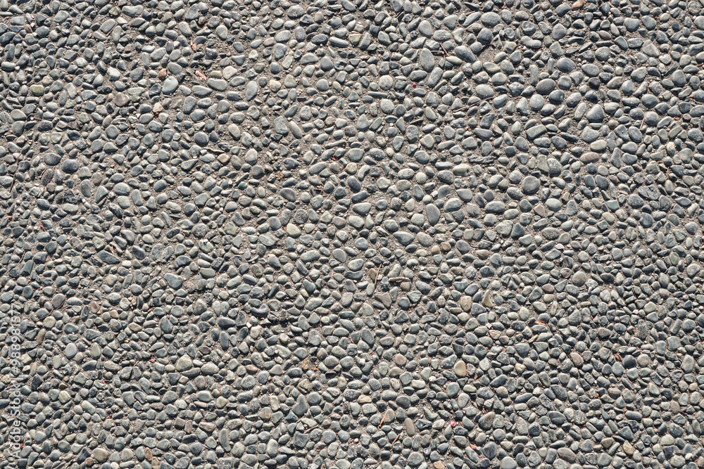A high-resolution image of a seamless texture of small grey pebbles ...