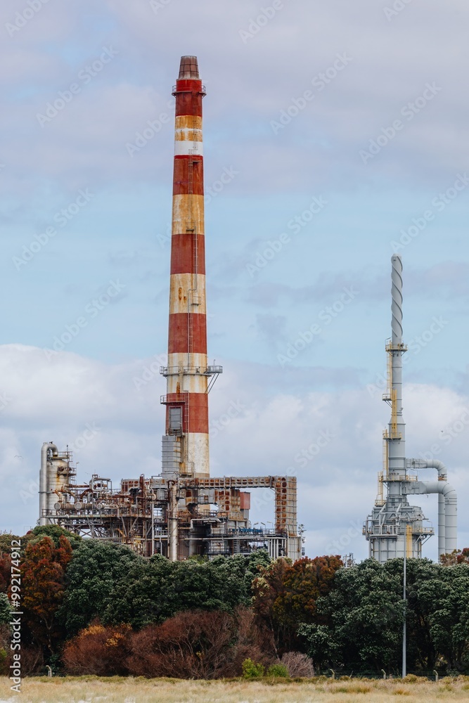 Oil refinery chimney at the decommisioned Marsden Point Refinery ...