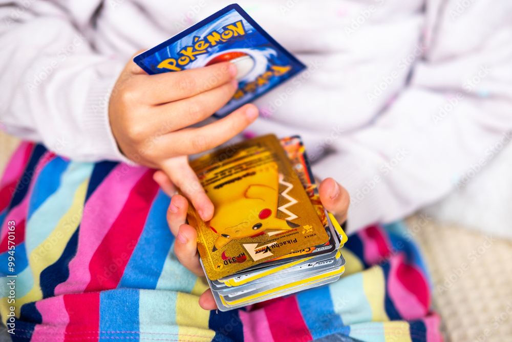 child collecting Pokemon Trading Card Game, Childhood nostalgia meets ...
