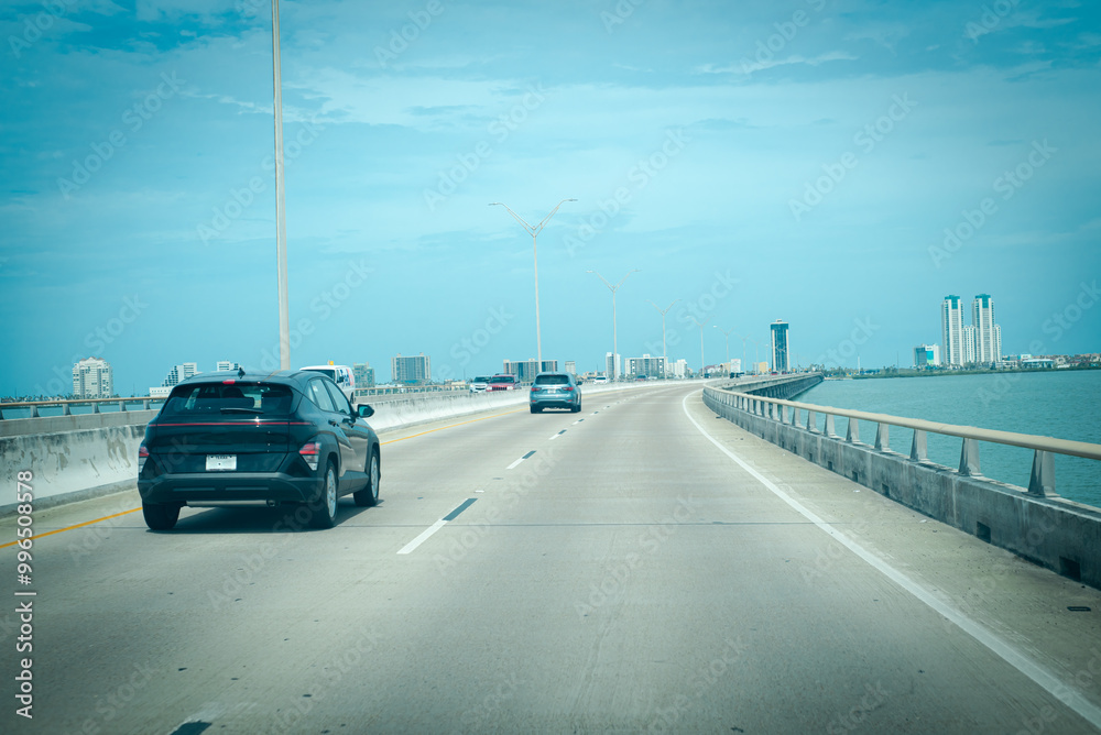 Busy traffic at The Queen Isabella Memorial Bridge or Queen Isabella ...