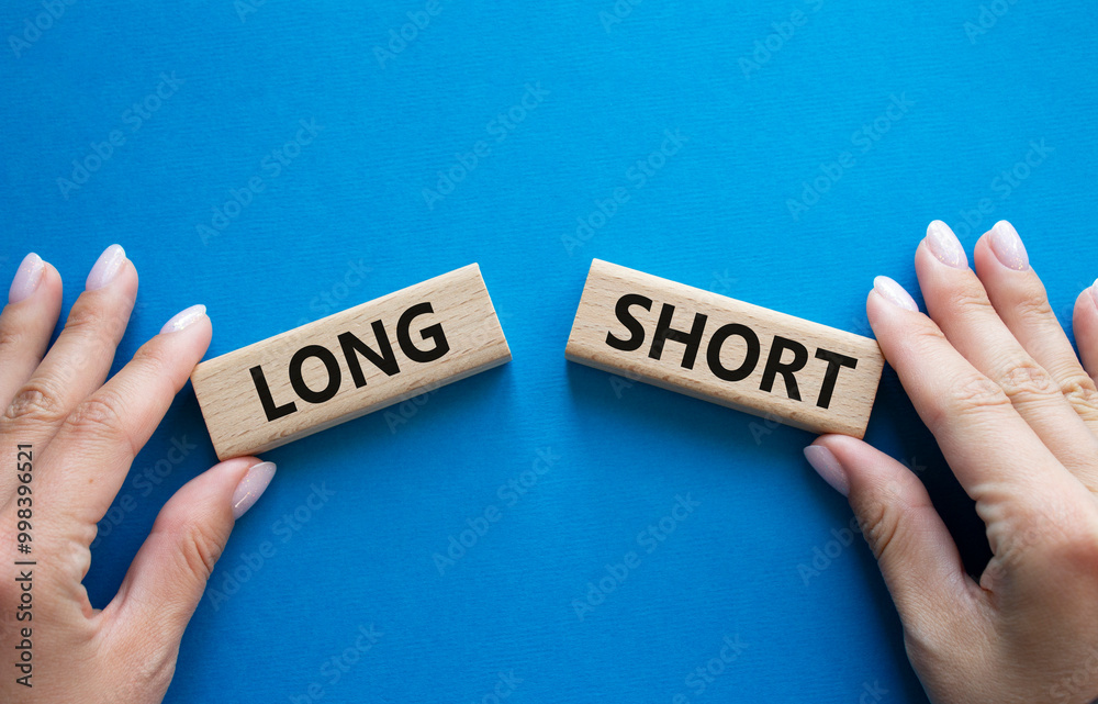 Short vs Long symbol. Concept word Short vs Long on wooden blocks ...