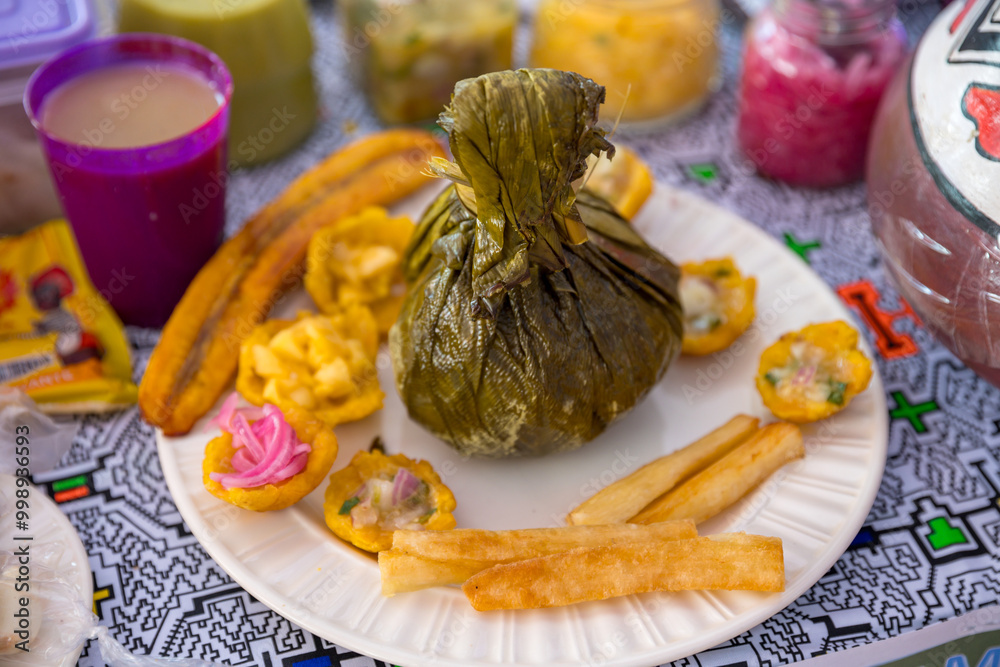 Chicken juane wrapped in bijao leaves. Peruvian jungle food, in all its ...