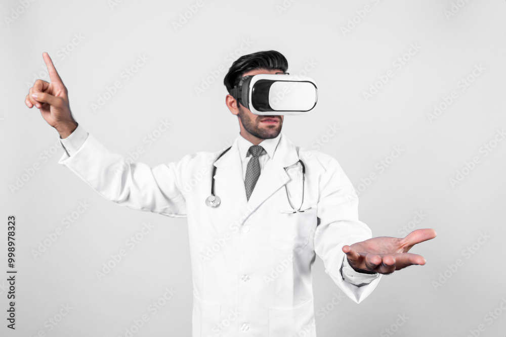 Caucasian doctor pointing and choosing medical data while standing ...