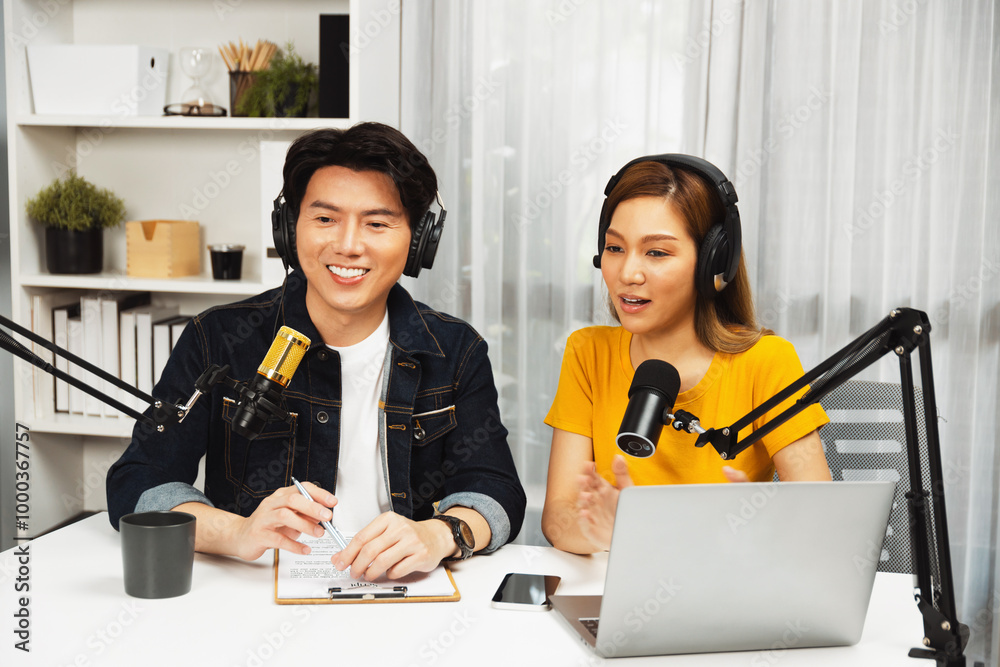 Smiling radio influencer hosts wearing headphones with channel social ...