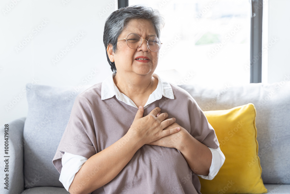 Chest pain, attack chest, emergency heartbeat asian senior woman ...