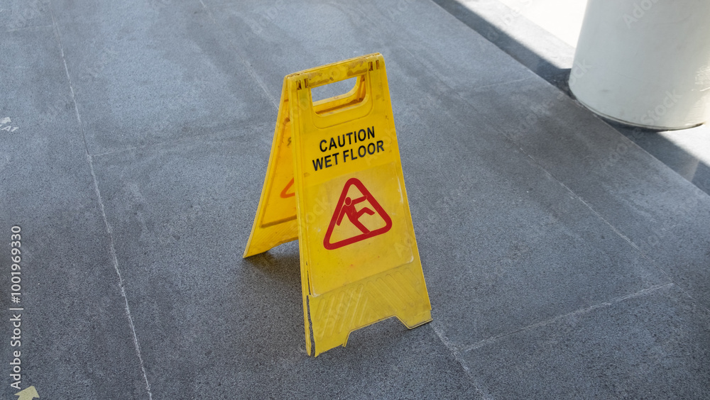 caution wet floor sign Stock Photo | Adobe Stock