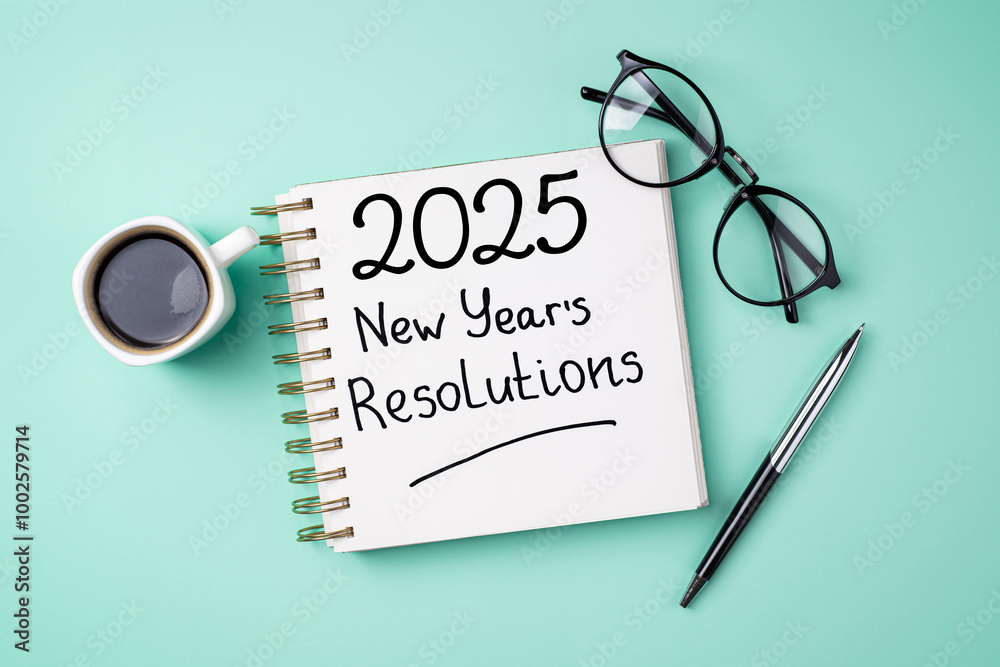 New year resolutions 2025 on desk. 2025 resolutions list with notebook ...