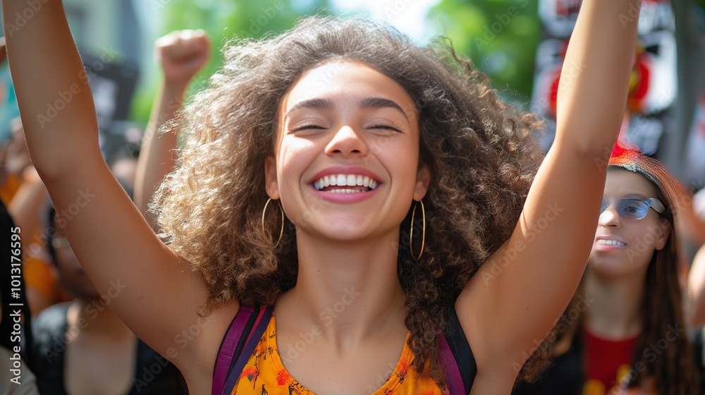 woman at rally showcasing strength and determination in fight for ...