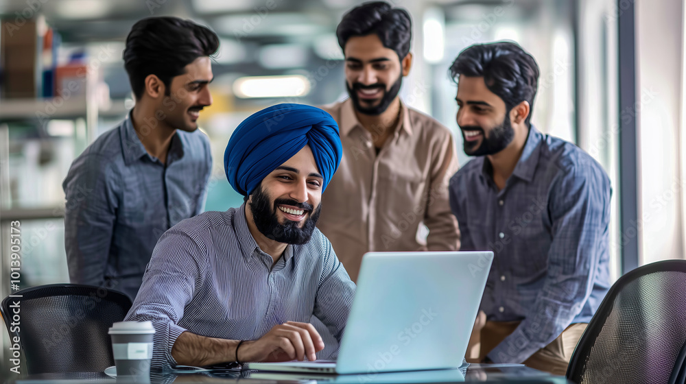 Team collaboration: cheerful group of Indian professionals working ...