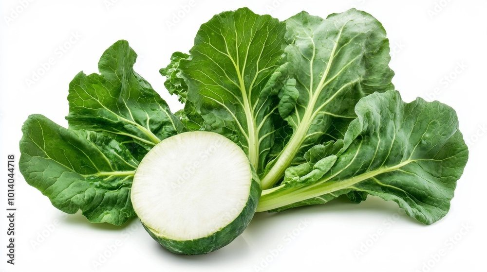 Fresh turnip greens with one cut in half and displayed with leaves ...