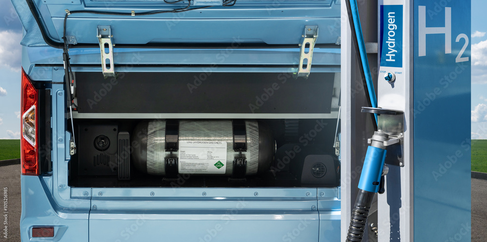 Hydrogen gas station and bus with an open hood and a hydrogen cylinder ...