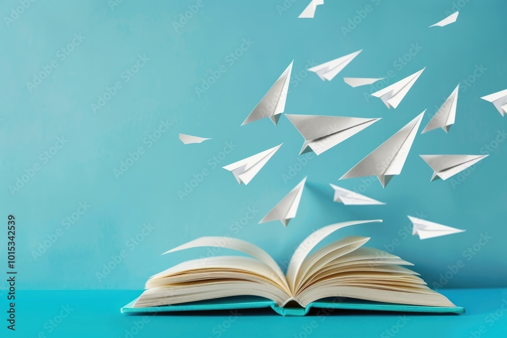 Open book with flying paper planes, isolated blue background. Stock ...